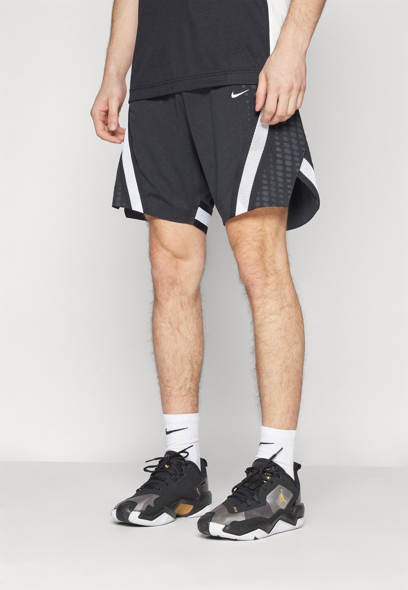 Nike Performance DRI-FIT ADV 8IN SHORT - Sports shorts - black ...