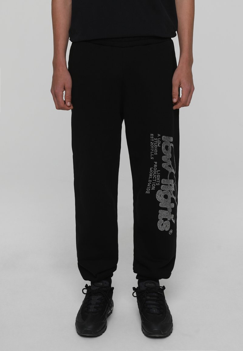 LOW LIGHTS STUDIOS® Spodnie treningowe/czarny - Zalando.pl