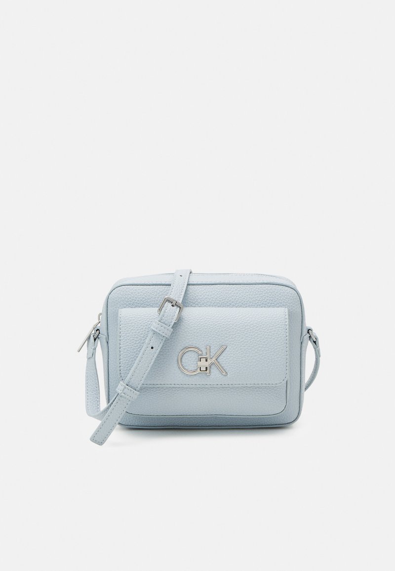 Calvin Klein LOCK CAMERA BAG WITH FLAP - Across body bag - pearl blue ...