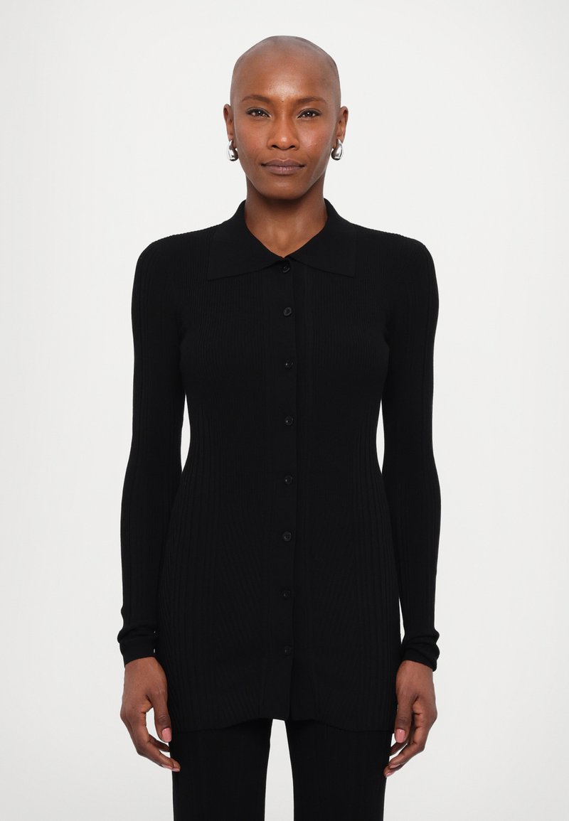 REMAIN Vesta na kopčanje - black/crno - Zalando.hr