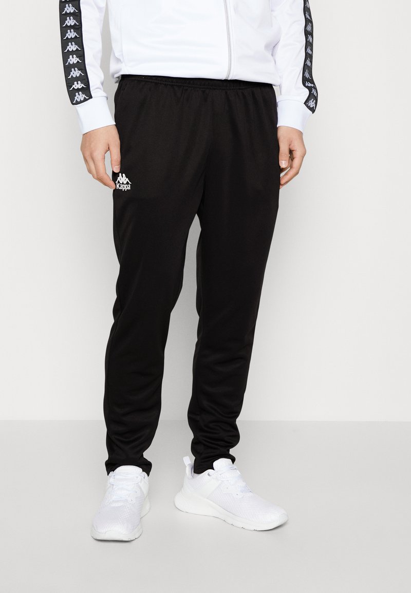 Kappa Tracksuit bottoms - caviar/black - Zalando