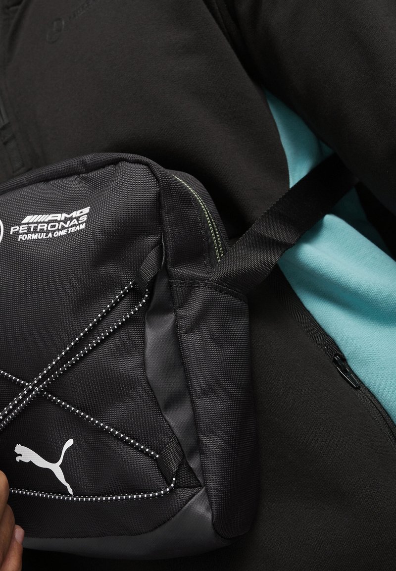 Puma MERCEDES-AMG PETRONAS MOTORSPORT - Across body bag - black ...