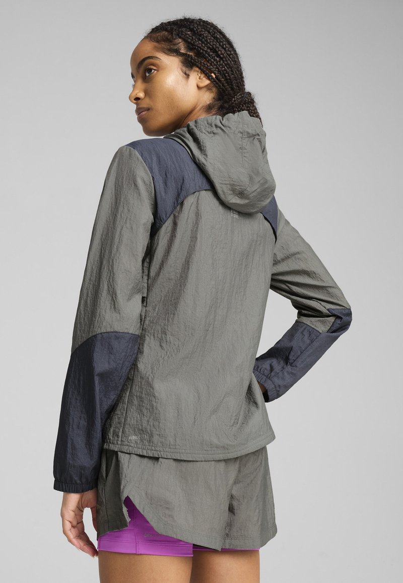 Puma SEASONS - Running jacket - cast iron/grey - Zalando