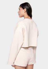 Kaotiko ADELE - Shorts - off white/crème - Zalando.nl