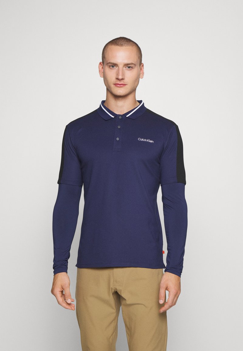 Calvin Klein Golf EVANS HYBRID - Polo shirt - peacoat/dark blue ...