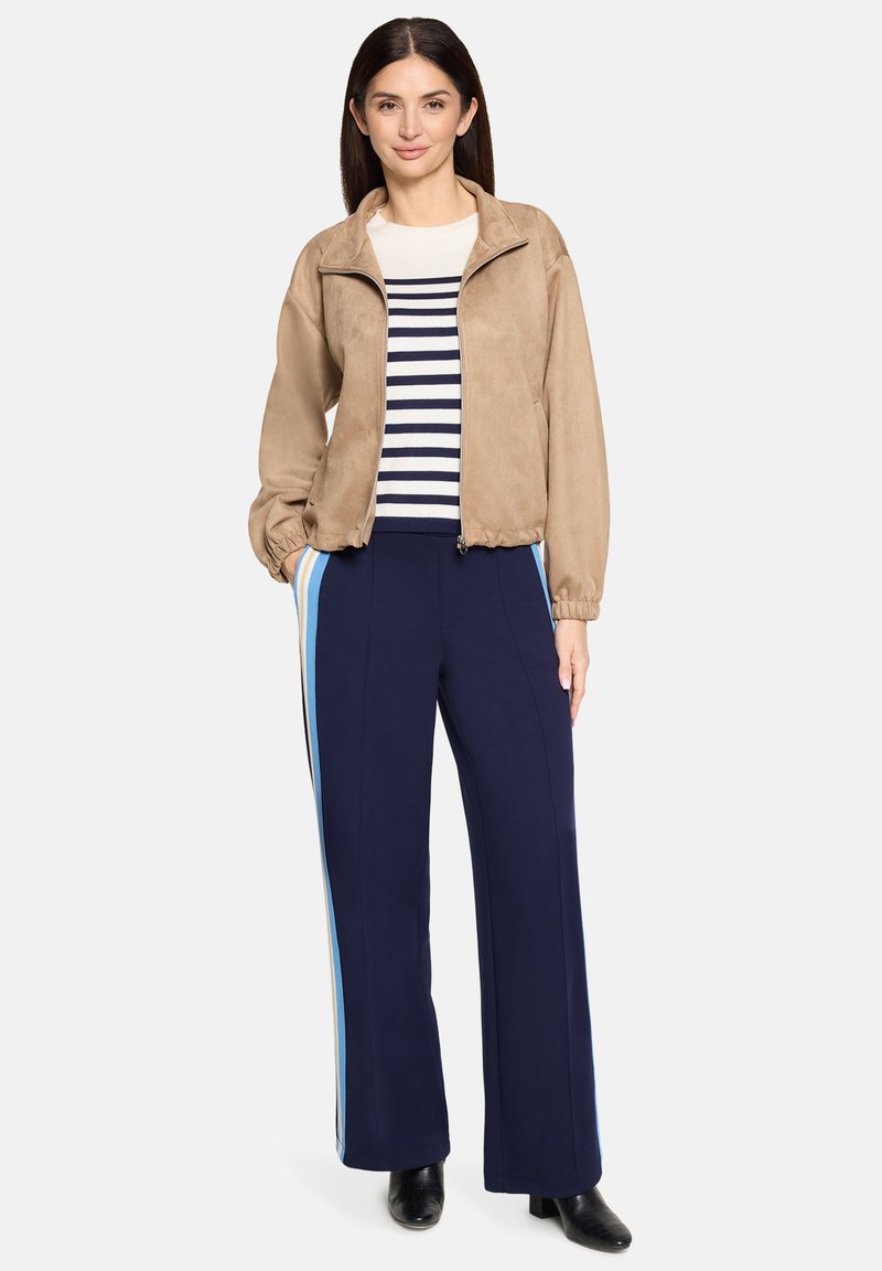 Cartoon MIT EINGRIFFTASCHEN - Summer jacket - beige - Zalando