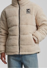 Karl Kani Winterjacke - sand - (Pre-owned) - Zalando.at