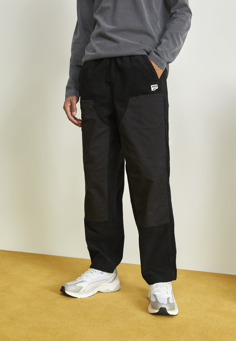 Puma DOWNTOWN PANTS - Trousers - black - Zalando.co.uk