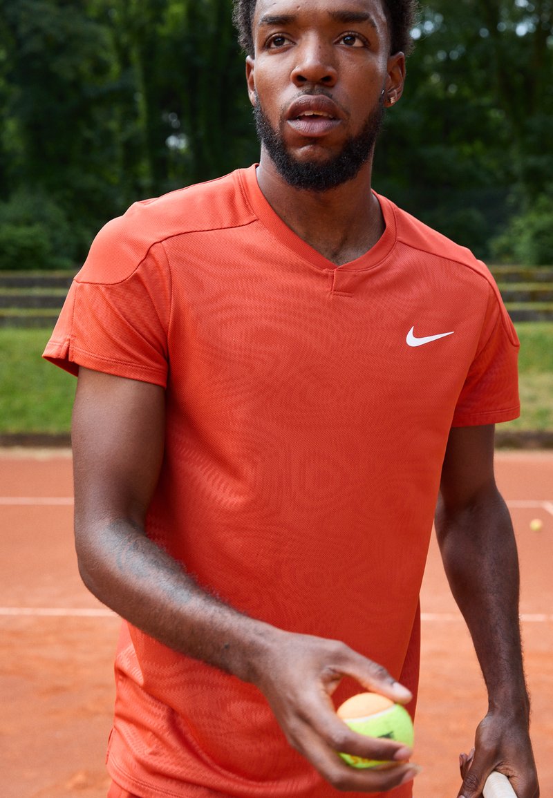 Nike Performance SLAM - T-Shirt sport - rust factor/white/arancione ...