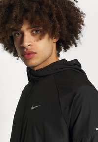 Nike Performance Running jacket - black - Zalando.co.uk
