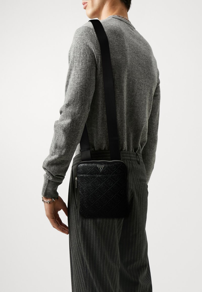 Guess MILANO CROSSBODY FLAT - Across body bag - black - Zalando
