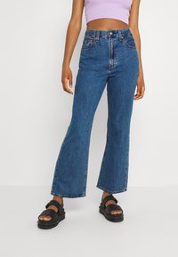 Levi's® Flared Jeans - blue denim - (Pre-owned) - Zalando