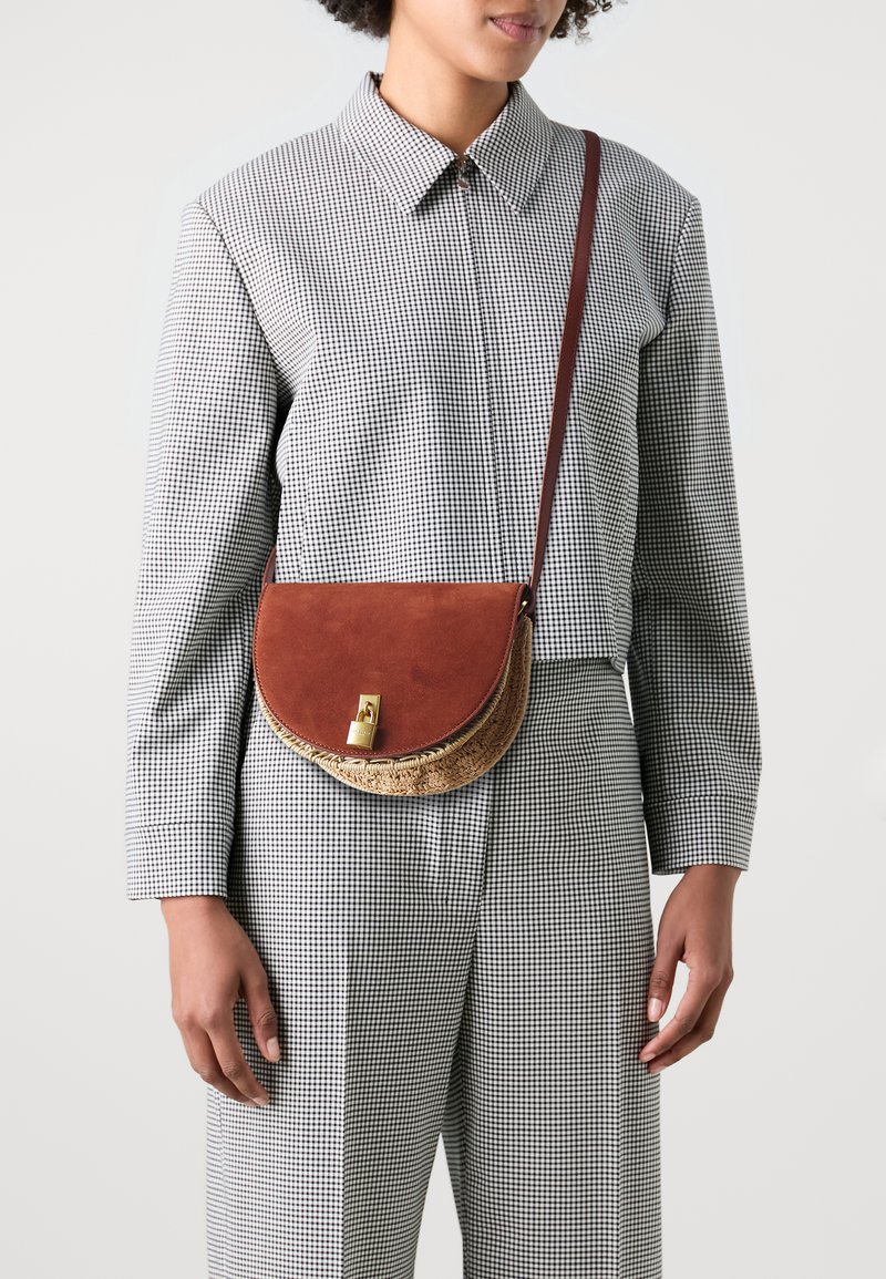 Ted Baker OXFORDD PADLOCK DETAIL SADDLE BAG - Cross body bag - brown ...