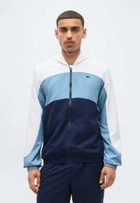 Lacoste Sport Training jacket - navy blue/aral/white/dark blue ...