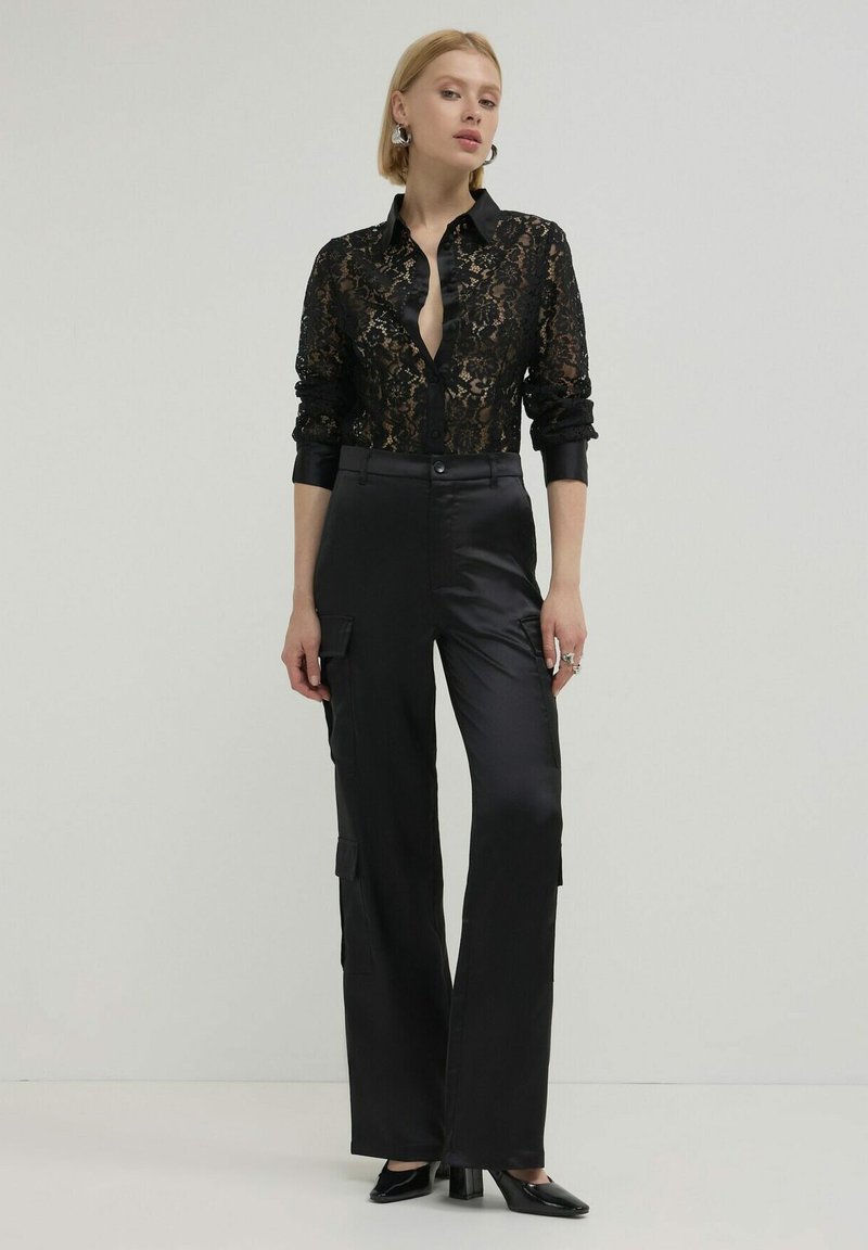 Calliope SIMIL - Pantaloni cargo - nero - Zalando.it