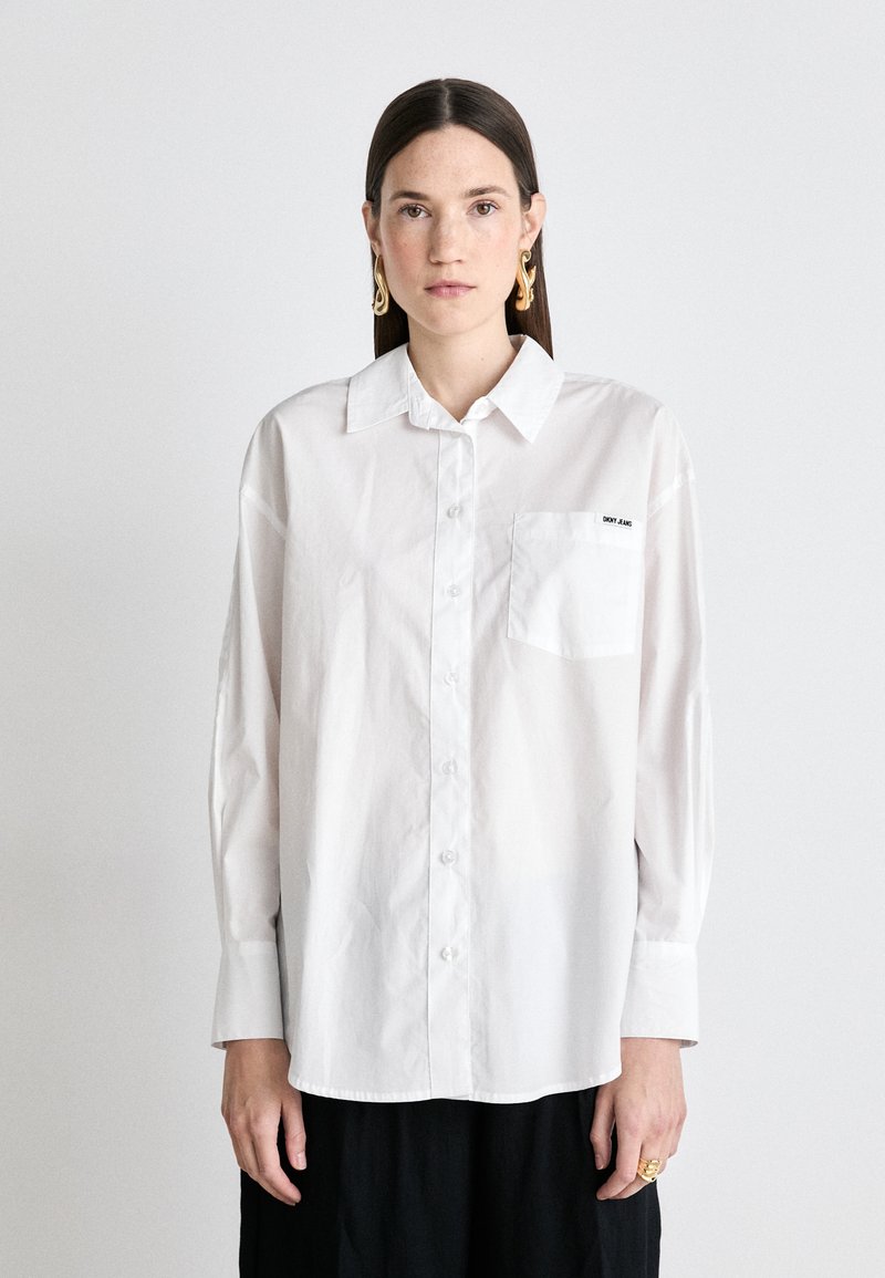 DKNY LONG SLEEVE BUTTON FRONT LOGO EMBROIDERY - Button-down blouse ...