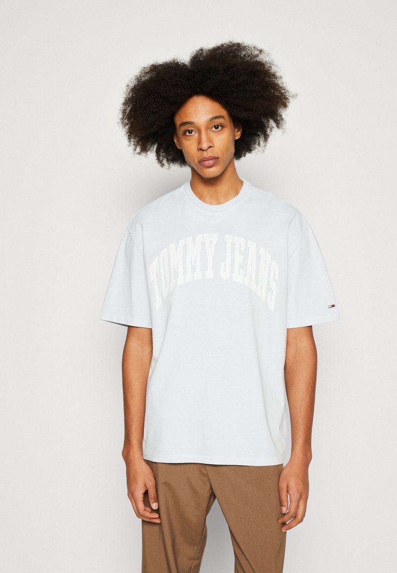 Tommy Jeans COLLEGIATE TEE UNISEX - T-Shirt print - shimmering blue ...