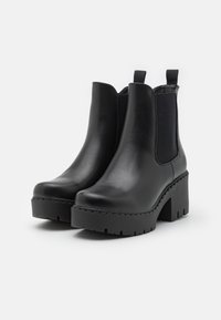 Koi Footwear ORSON SWITCH CHELSEA BOOTS - Enkellaarsjes met plateauzool ...