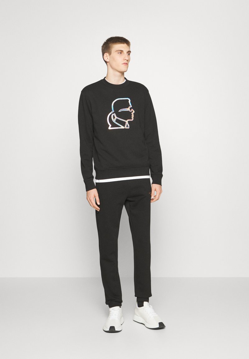 KARL LAGERFELD Träningsbyxor - black/svart - Zalando.se