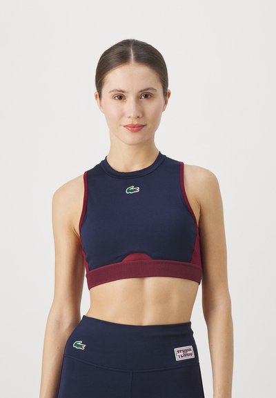 Lacoste Sport SPORTS BRA - Sport-BH mit mittlerer Stützkraft - gelato ...
