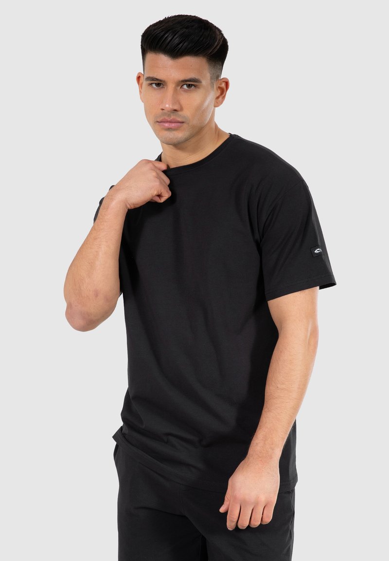 Smilodox AVIS - Basic T-shirt - schwarz/black - Zalando.de