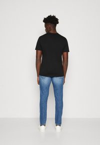 Antony Morato ROLLING STONES REGULAR FIT WITH MATT PLASTIC AND RUBBER ...
