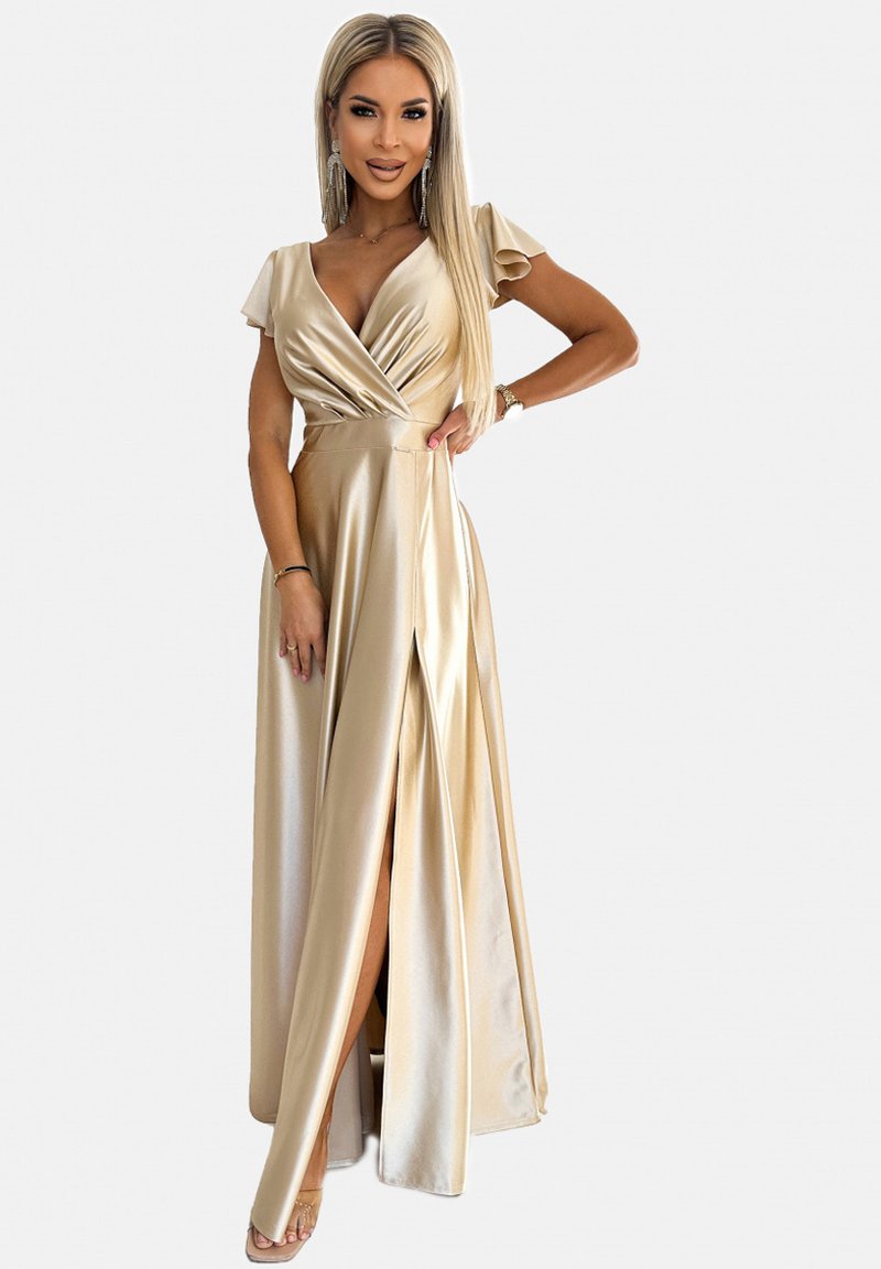 Chelsea Clark GLOSSY WITH A NECKLINE AND A SLIT ON THE LEG - Galajurk ...