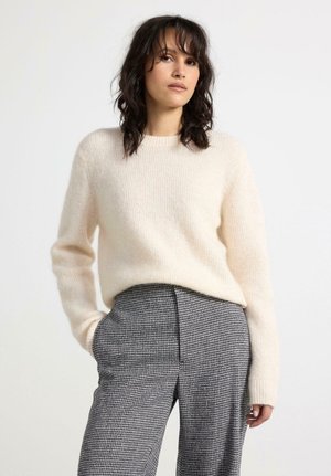 Swetry damskie - modne, ciepłe i markowe | Zalando