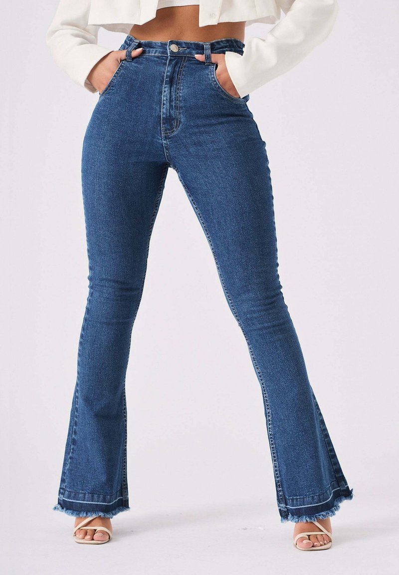 HERMAN&CO HIGH WAISTED FRAYED FLARE - Bootcut jeans - mid blue/blue ...