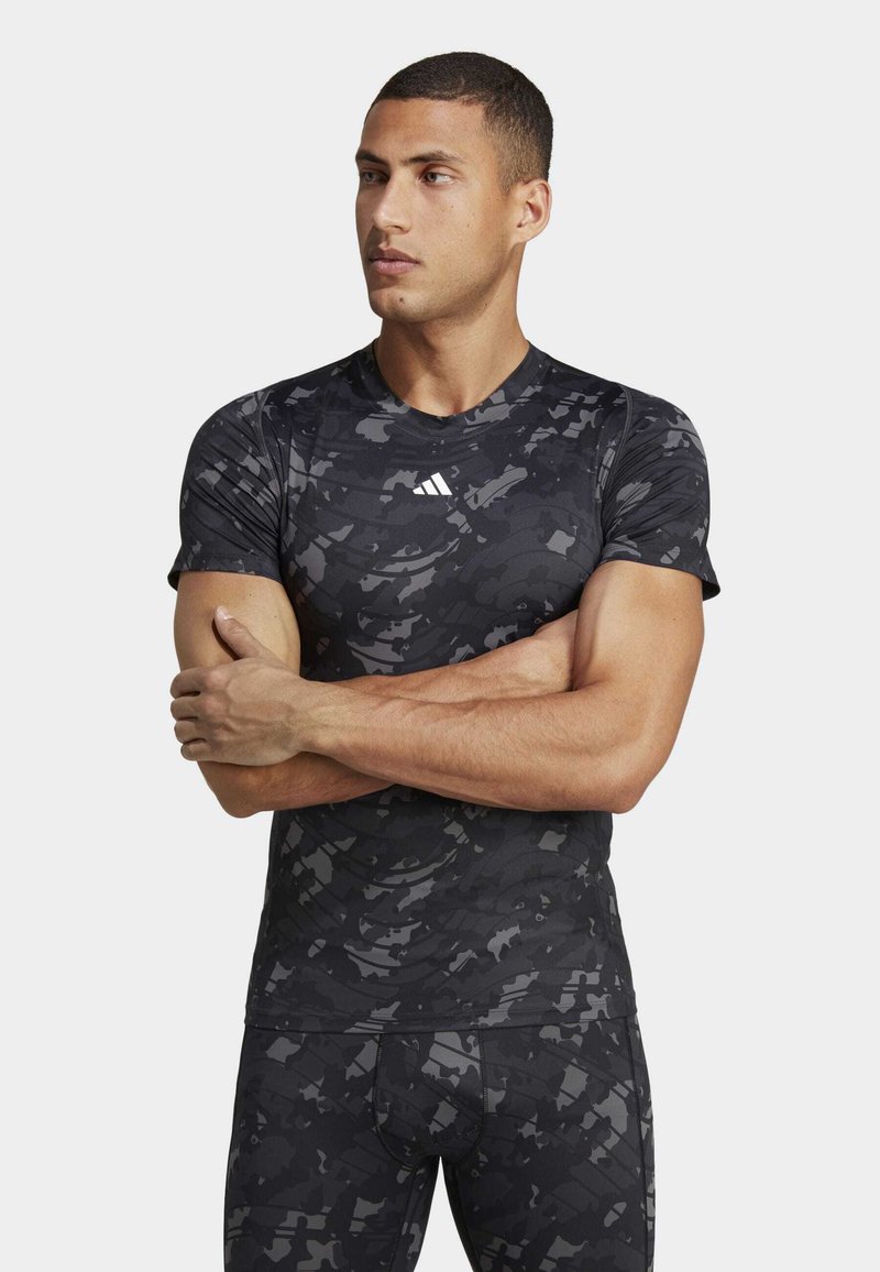 adidas Performance TECHFIT ALLOVER PRINT - Print T-shirt - black - Zalando