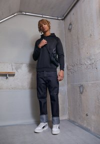 Puma TECH FL - Jersey con capucha - black/negro - Zalando.es