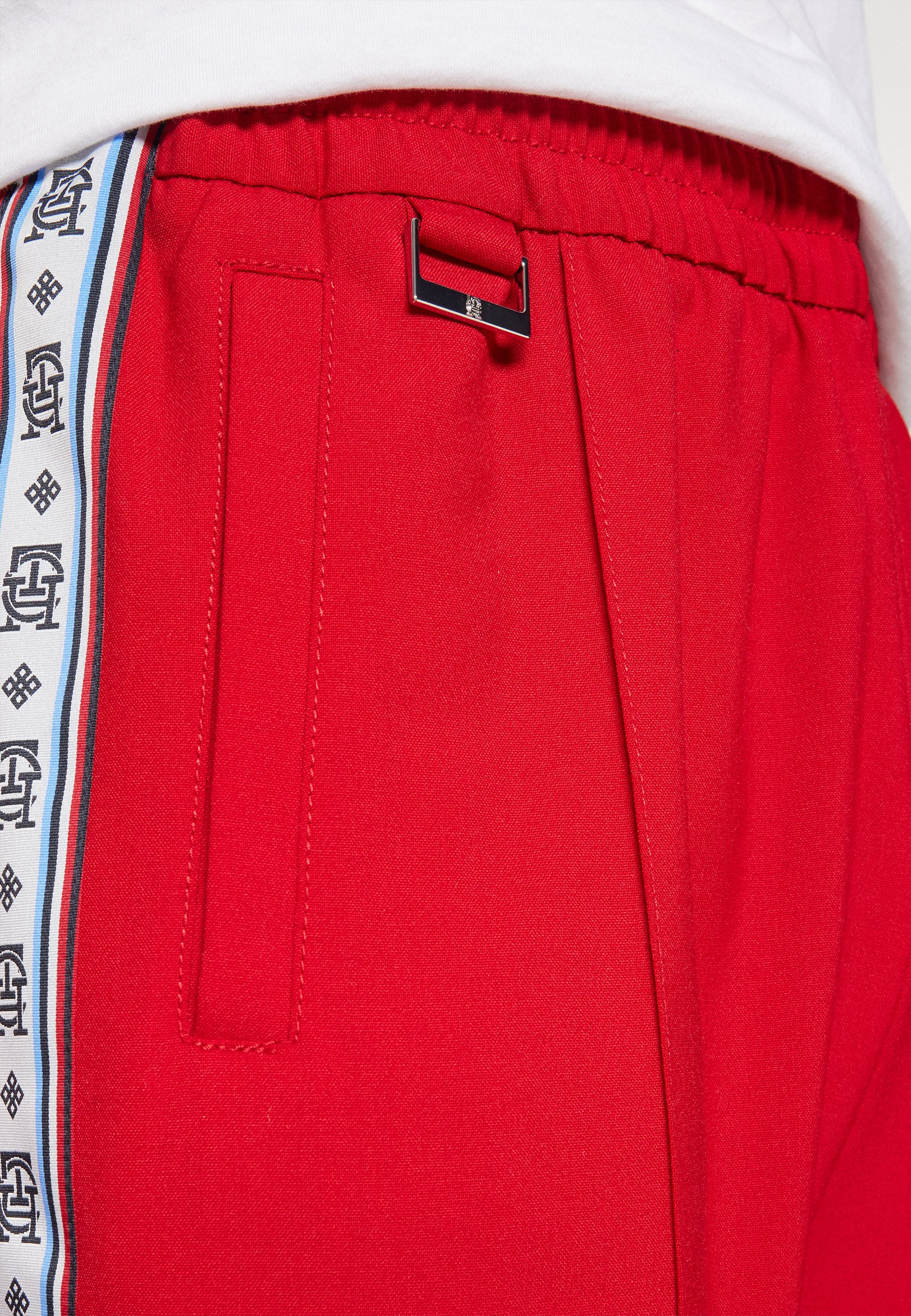 Tommy Hilfiger TH X CLOT TRACKSUIT PANT UNISEX Stoffhose arizona red rot Zalando