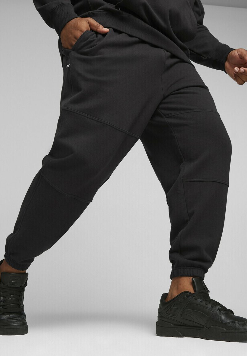 Puma DOWNTOWN - Tracksuit bottoms - black - Zalando.ie