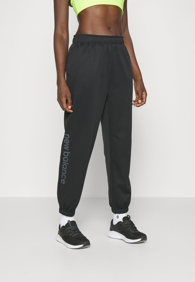 New Balance RELENTLESS PERFORMANCE - Jogginghose - black/schwarz ...