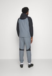 Nike Performance ACADEMY HOODED TRACK JACKET - Training jacket - cool ...