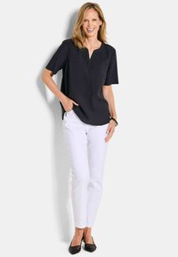 GOLDNER PFLEGELEICHTE - Blouse - black - Zalando