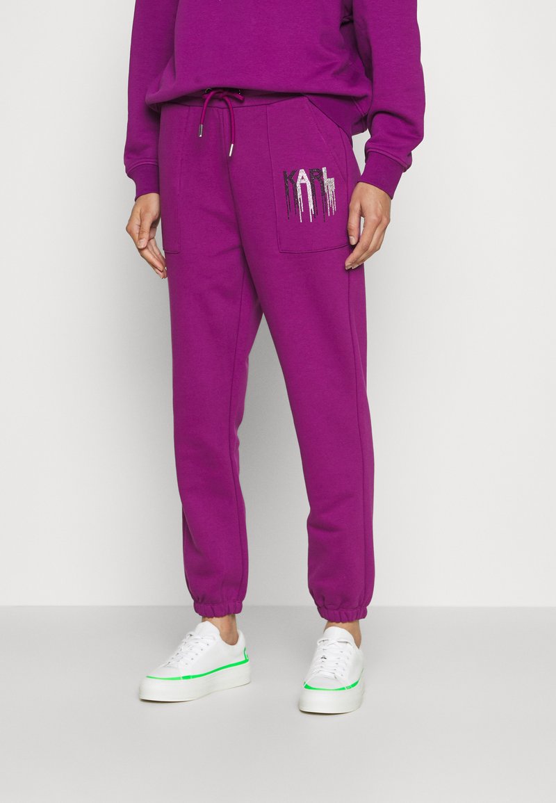 KARL LAGERFELD RHINESTONE - Tracksuit bottoms - phlox/pink - Zalando