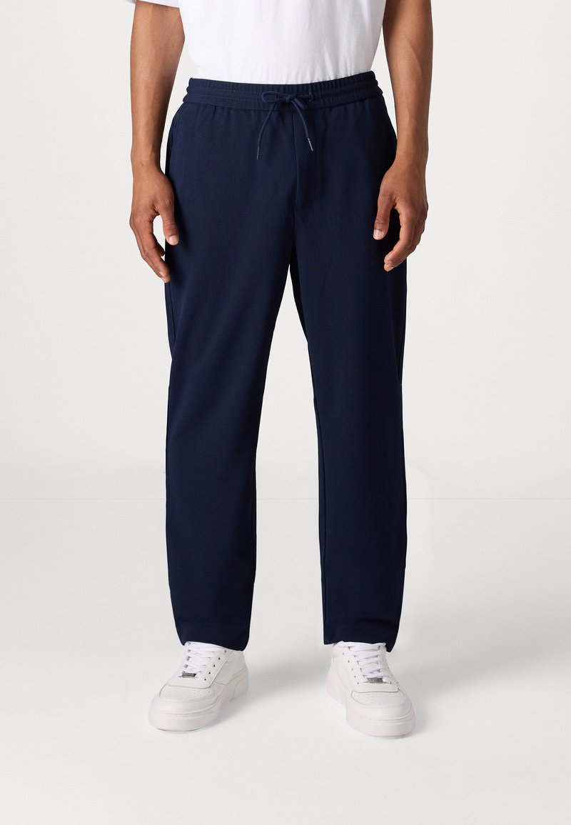 Pier One SMART JOGGER - Tracksuit bottoms - dark blue - Zalando.ie