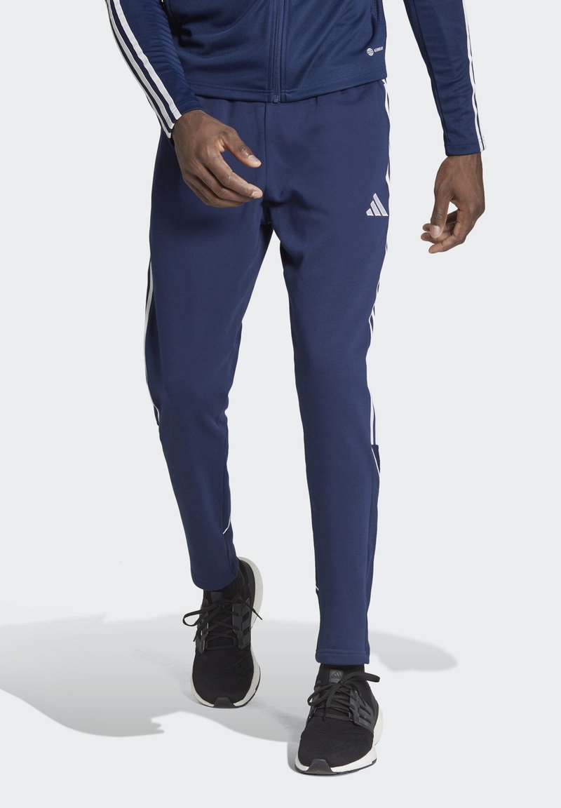 adidas Performance TIRO 23 LEAGUE - Tracksuit bottoms - team navy blue ...