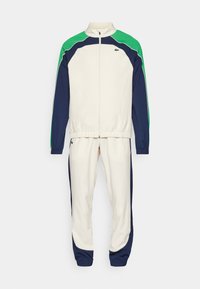 Lacoste Sport TRACKSUIT TOUR - Tuta - lapland/navy blue/calathea/avorio ...