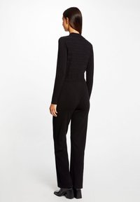 Morgan STRAIGHT ZIPPED - Mono - black/negro - Zalando.es