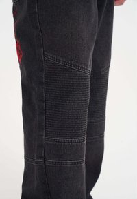 Ed Hardy SWORD AND DAGGER MOTROCROSS - Relaxed fit jeans - black - Zalando