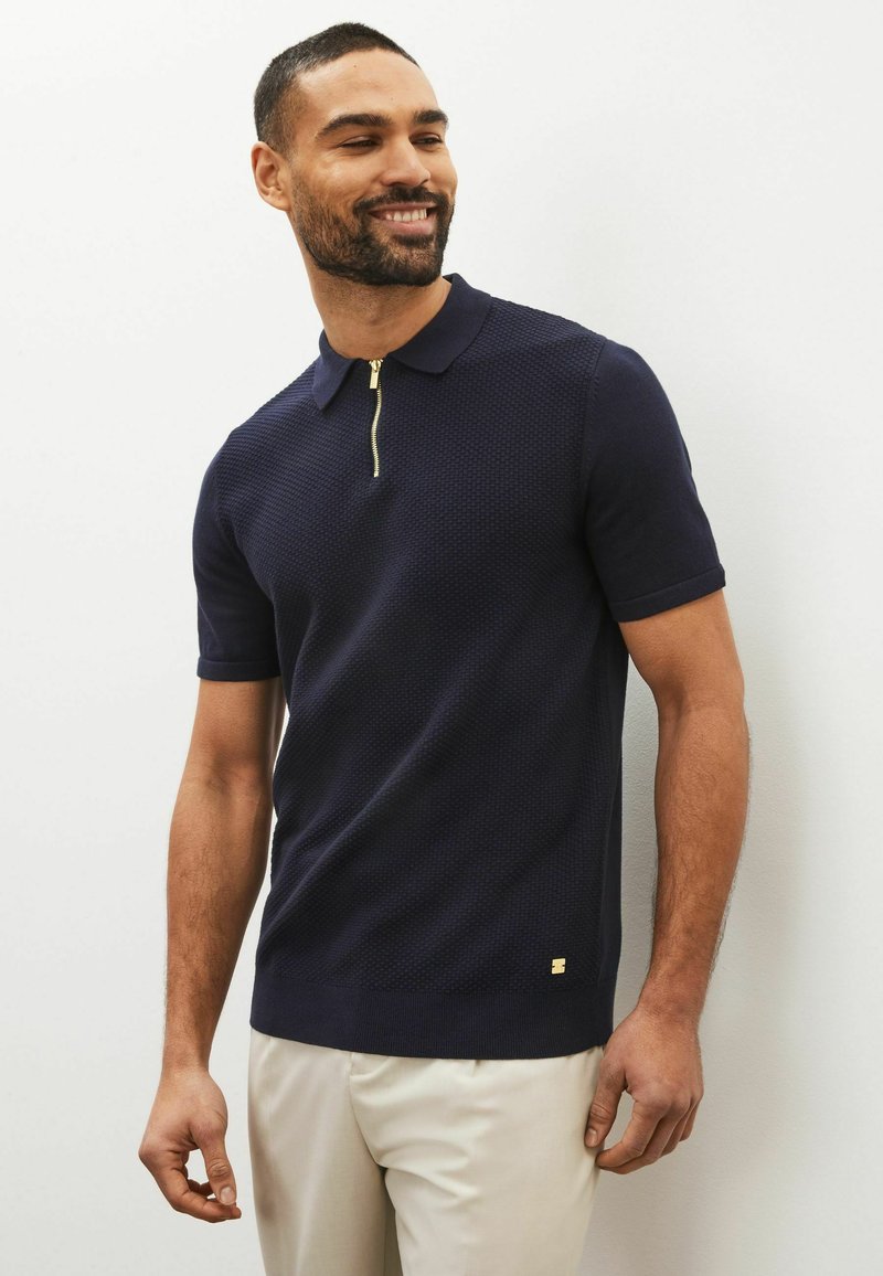 Next BUBBLE TEXTURE KNITTED ZIP POLO SHIRT - Poloshirt - indigo blue ...
