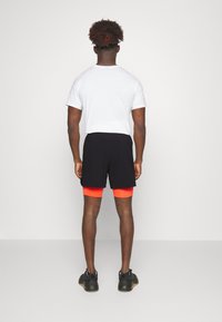 adidas Performance POW SHORT - kurze Sporthose - black/bright red ...