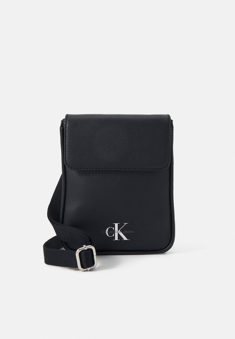 Calvin Klein Jeans MONOGRAM SOFT PHONE UNISEX - Phone case - black ...