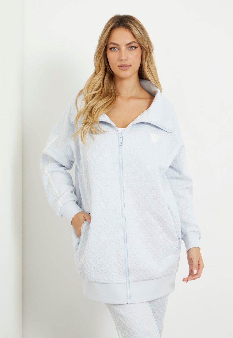 Guess LANGES -PRÄGELOGO - Mikina na zip - himmelblau/světle modrá ...