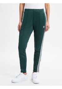 adidas Originals JOGGING - Tracksuit bottoms - tanne/evergreen - Zalando