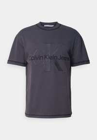 Calvin Klein Jeans MONOLOGO TEE UNISEX - Camiseta estampada - washed black/negro - Zalando.es