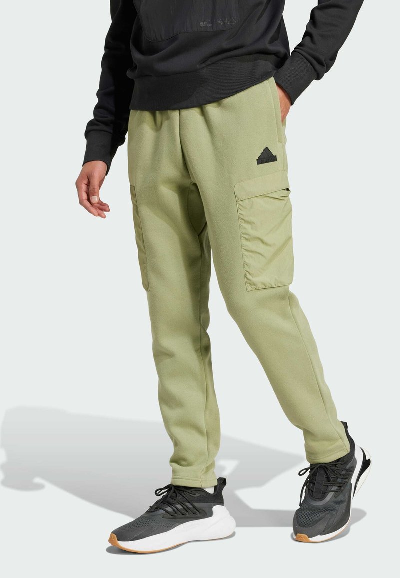 adidas Sportswear CITY ESCAPE FLEECE - Tracksuit bottoms - tent green ...