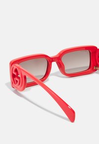 Gucci Sunglasses - red - Zalando.co.uk